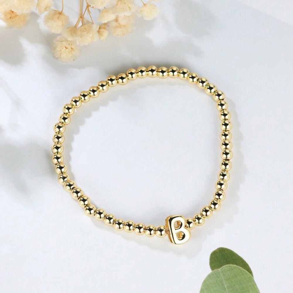 Metal Tone Beaded Stretch Bracelet Featuring Initial Bead ...